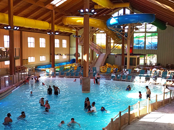The indoor waterpark's vaulted wooden ceiling creates the perfect setting for aquatic joy &ndash; proof that "rain or shine" isn't just a weather forecast, it's a vacation guarantee.