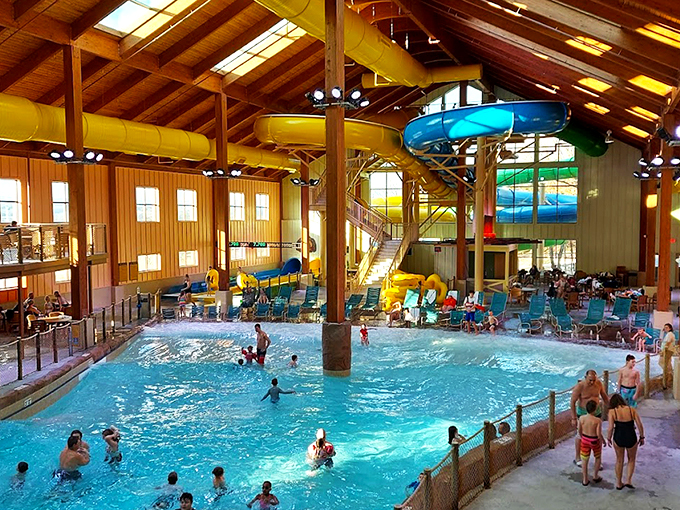 The indoor waterpark's vaulted wooden ceiling creates the perfect setting for aquatic joy &ndash; proof that "rain or shine" isn't just a weather forecast, it's a vacation guarantee.