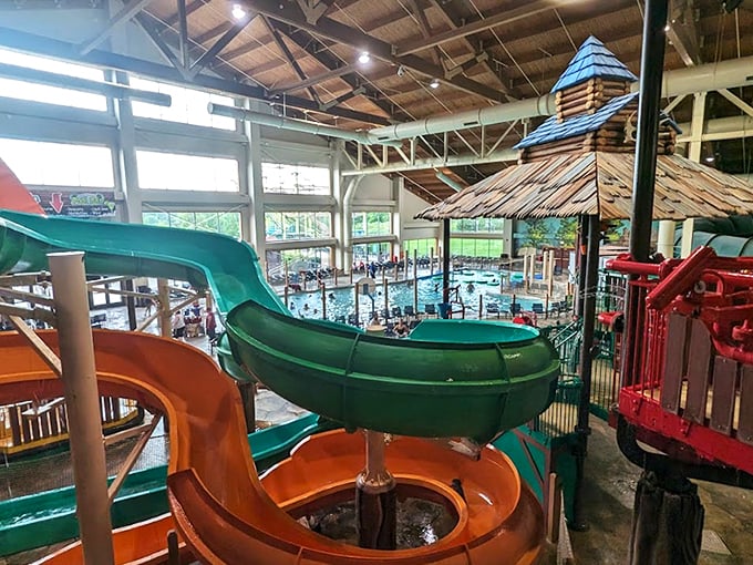 The indoor oasis where summer never surrenders to winter. Lounge chairs stand at attention, ready for parents who'll claim they're "just watching" but secretly yearn for that waterslide plunge.