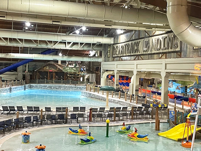 The indoor oasis where summer never surrenders to winter. Lounge chairs stand at attention, ready for parents who'll claim they're "just watching" but secretly yearn for that waterslide plunge.
