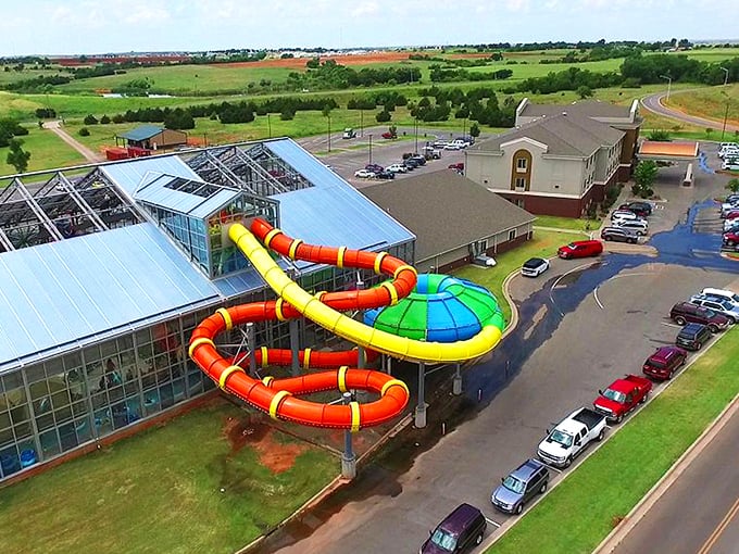 The architectural equivalent of a tropical vacation in Oklahoma. Those colorful tubes aren't just for show &ndash; they're portals to pure, climate-controlled joy regardless of what Mother Nature's brewing outside.