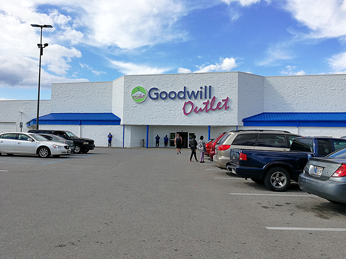 The unassuming exterior of Goodwill Outlet belies the treasure-hunting adventure within, like a pirate's chest disguised as an ordinary shipping container.