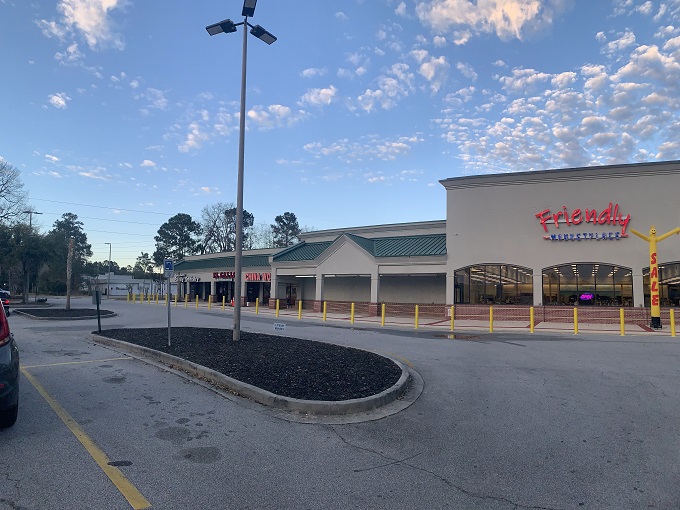Welcome to bargain heaven! This cheerful yellow facade promises a treasure trove of deals inside, where your wallet can breathe a sigh of relief.