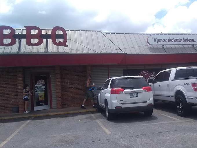 The unassuming exterior of Earl's Rib Palace hides barbecue greatness behind that bold red BBQ sign. Like finding a diamond in a strip mall.