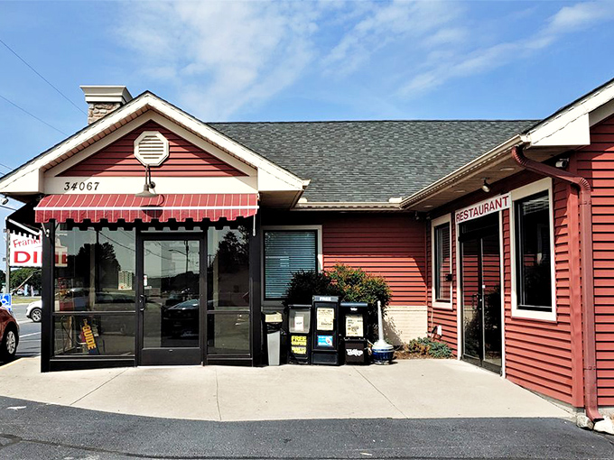 The cherry-red exterior of Frankford Family Diner stands out like a beacon of comfort food hope on Route 113, promising delicious salvation for hungry travelers.
