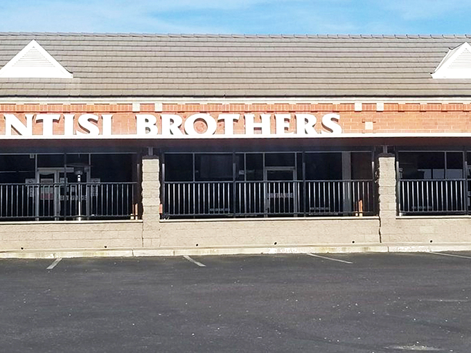 The unassuming exterior of Santisi Brothers &ndash; proof that the best culinary treasures often hide in plain sight, waiting for hungry explorers.
