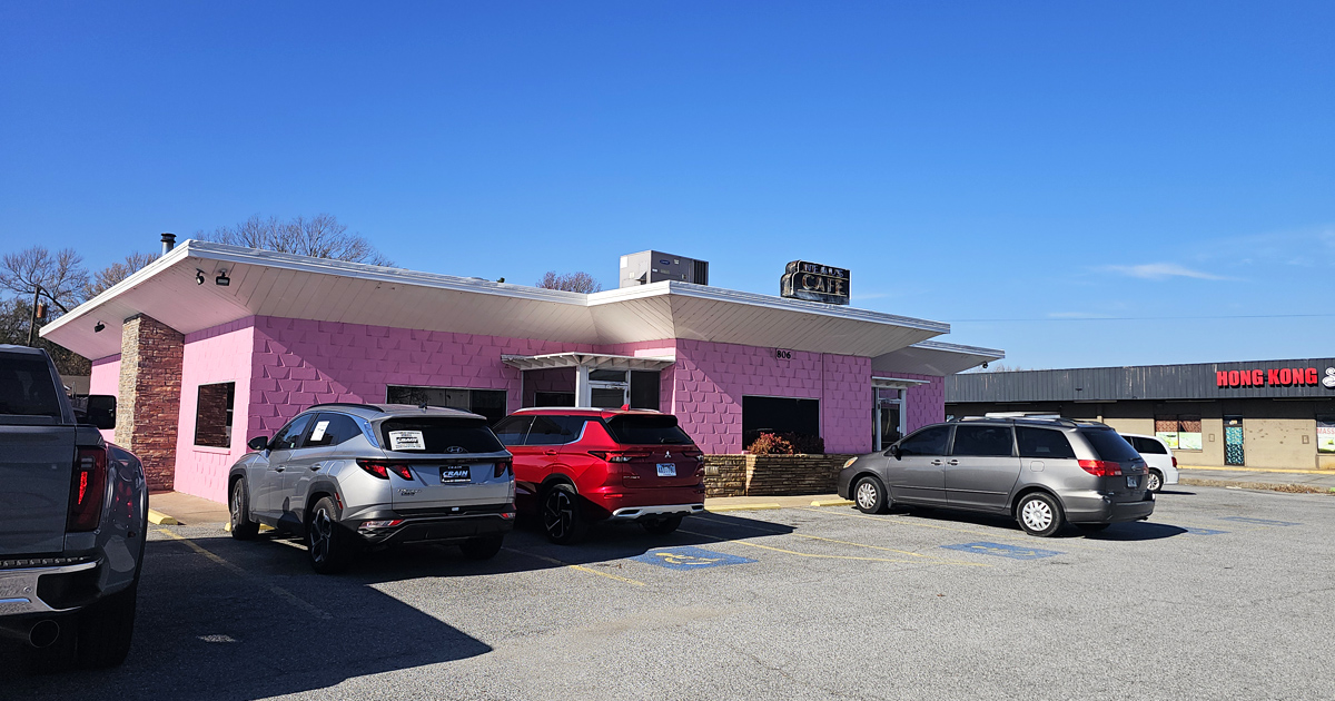 The pink palace of poultry stands proudly against the Arkansas sky, like a delicious mirage beckoning hungry travelers from miles around.