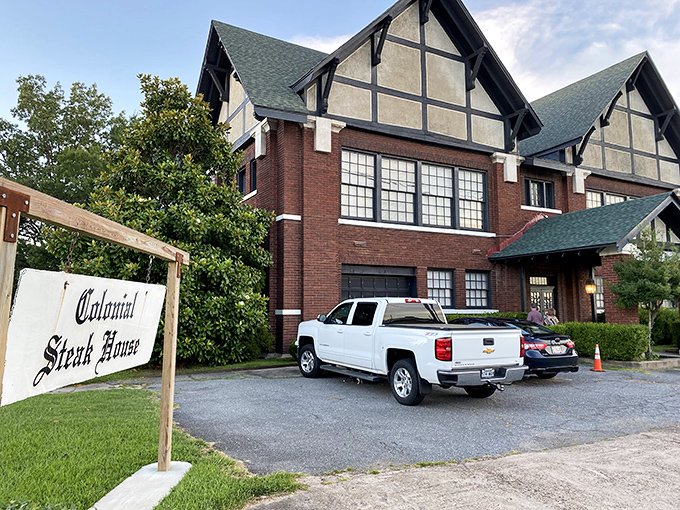 The Tudor-style charm of Colonial Steakhouse stands proudly in Pine Bluff, where brick, timber, and tradition come together like old friends reuniting over prime rib. 