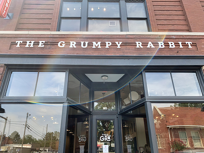 The historic brick facade of The Grumpy Rabbit stands proudly on Lonoke's main street, its vintage charm belying the culinary adventure waiting inside.