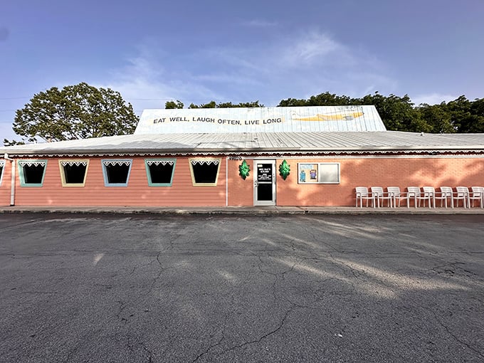"Laugh Often, Live Long" isn't just a motto painted on this coral-colored sanctuary—it's the promise Mrs. Mac's Kitchen delivers with every Key lime bite.