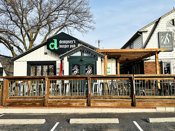 Dempsey's white cottage-like exterior stands proudly in Wichita, its distinctive green logo beckoning burger enthusiasts like a meaty lighthouse on a hungry sea.