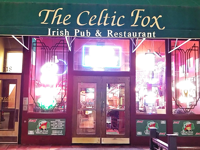 The Celtic Fox's emerald-green awnings stand out like a beacon of Irish hospitality on Topeka's historic downtown strip. Architecture that whispers "come in for a pint."
