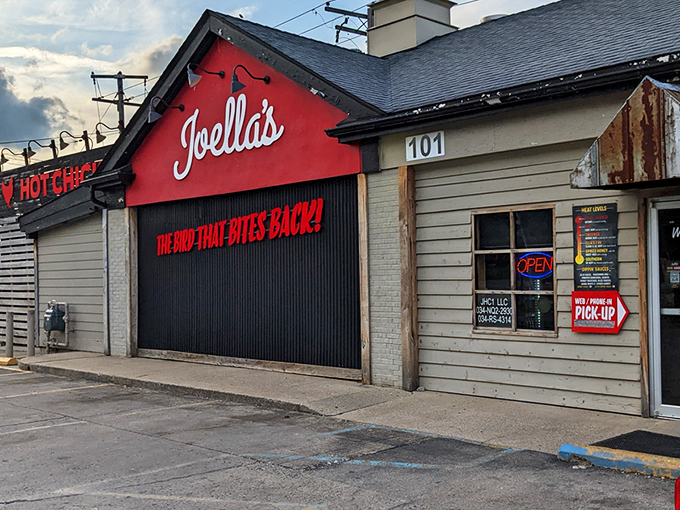 The Bird That Bites Back! isn't just a catchy slogan&mdash;it's a fiery promise painted across Joella's distinctive red facade that beckons heat-seekers from miles around.