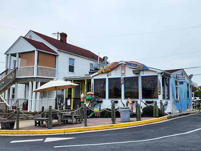 Paradise found! The charming exterior of Beef 'n Buns 'n Paradise beckons with its beachy vibe and outdoor seating&mdash;a tropical escape in suburban Maryland.