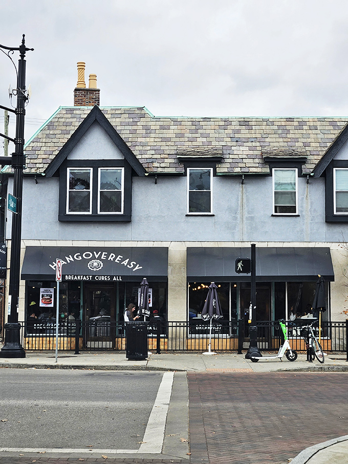 The iconic black awning promises salvation with three simple words: "BREAKFAST CURES ALL." Never has a restaurant sign spoken such profound truth.