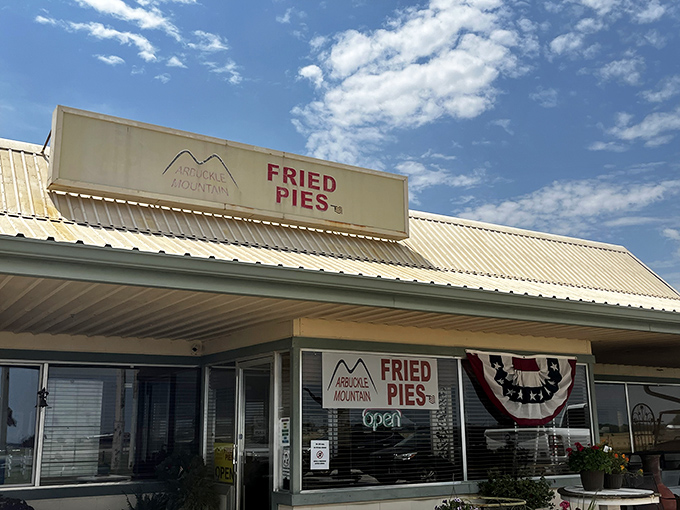 The humble exterior belies the culinary treasures within. Under Oklahoma's big sky, this unassuming building houses pie perfection that's worth every mile of the journey.