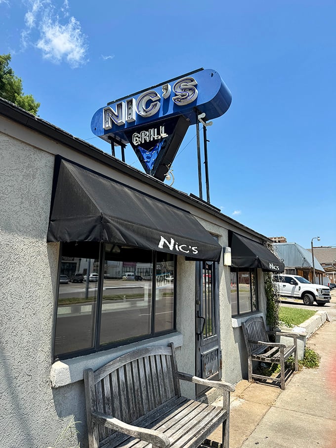 The unassuming exterior of Nic's Grill looks like any other house on the block&mdash;until you spot that sign promising burger nirvana inside.