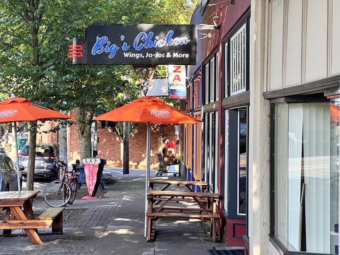 The neon blue sign beckons like a lighthouse for the chicken-obsessed. Portland's unassuming exterior hides flavor treasures within.