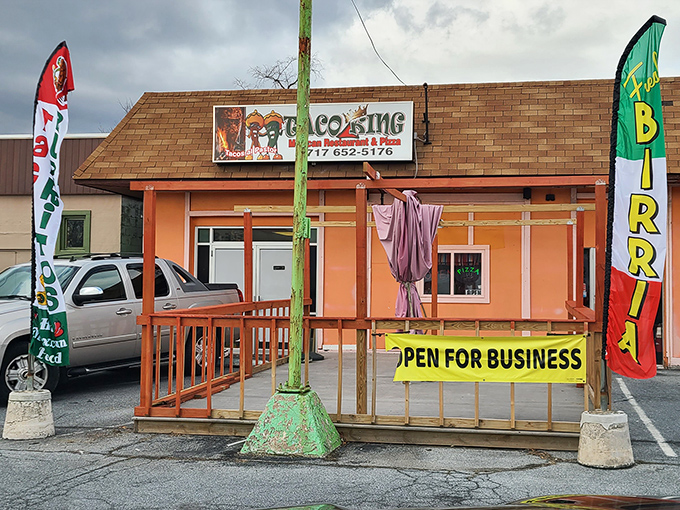 The bright orange exterior of Taco King stands like a beacon of culinary promise on Allentown Boulevard. Your taste buds' happy place awaits!