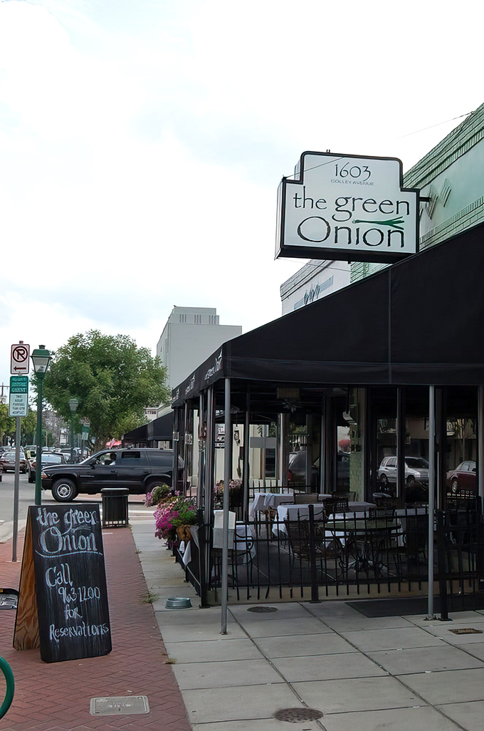 The Green Onion's charming exterior welcomes you with its understated elegance and inviting patio. Like a good first date, it makes a promising impression without trying too hard.