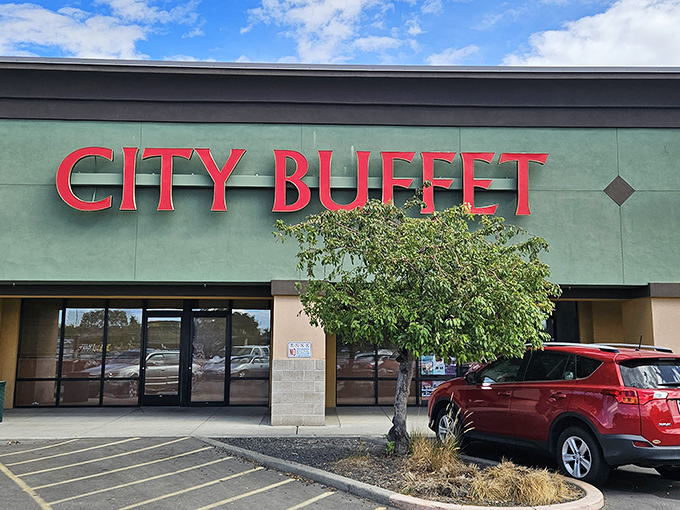 The bold red letters of City Buffet beckon like a Vegas marquee promising jackpots of flavor instead of cash.