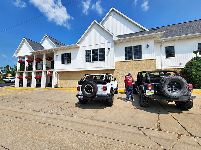 The white clapboard facade of Breitbach's stands like a beacon of comfort food, hanging flower baskets swaying in the Iowa breeze.