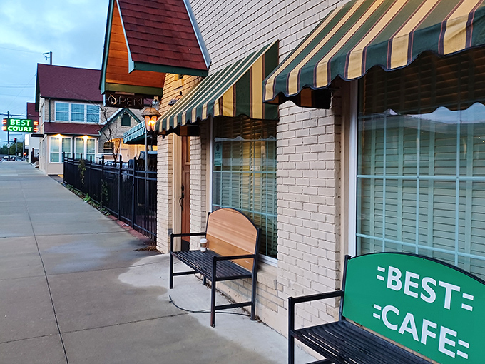 The charming cream brick exterior of Best Cafe & Bar feels like a time capsule of Hot Springs history, complete with those classic green awnings. 
