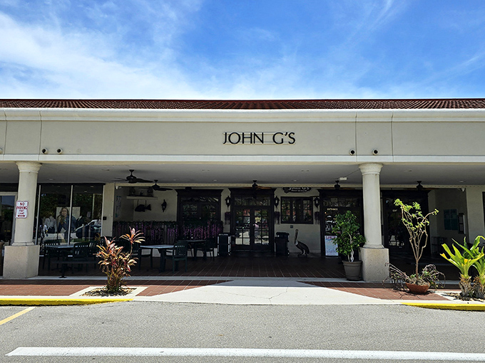 A simple white facade that belies the culinary treasures within—like finding a pearl in an unassuming oyster shell.