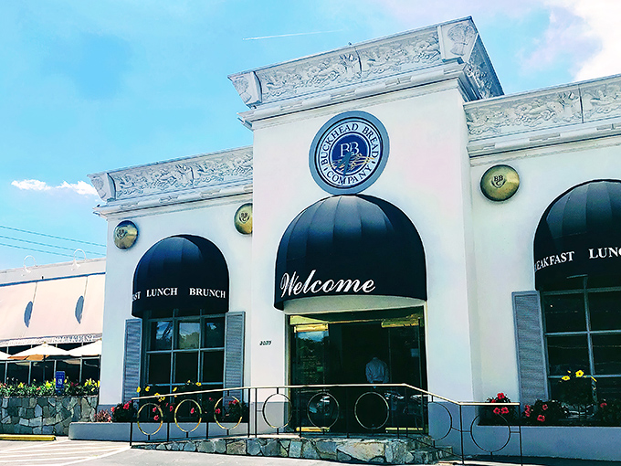 The elegant white facade of Corner Cafe stands like a culinary lighthouse in Buckhead, beckoning hungry Atlantans with promises of breakfast bliss.