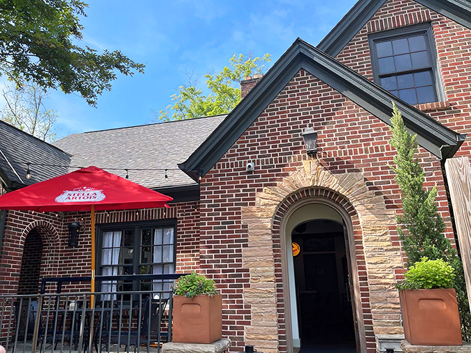 The Manchester Arms brings quintessential British charm to College Park with its stately brick exterior and inviting red patio umbrella. England has landed in Georgia!