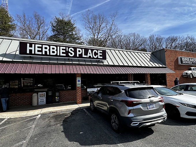The iconic white Beetle #53 mounted on Herbie's brick exterior isn't just decoration&mdash;it's a beacon calling hungry travelers home to breakfast, served 24/7.