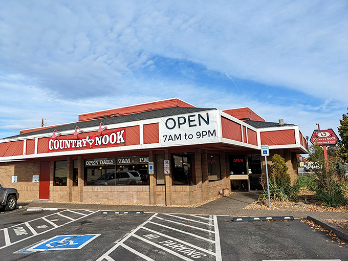The iconic red-trimmed exterior of Big O Country Nook stands like a beacon for hungry travelers, promising comfort food salvation in Redmond's bustling landscape.