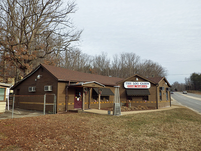The unassuming exterior of The Log Cabin Restaurant proves once again that the best seafood treasures often hide in plain sight.