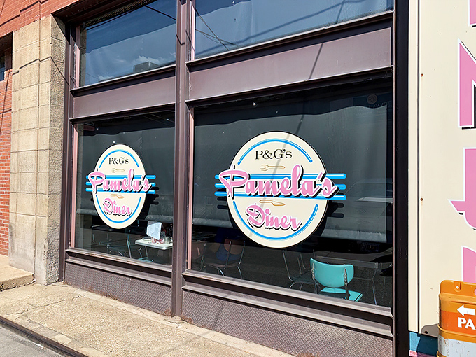Pittsburgh's breakfast mecca announces itself with a cheerful blue awning and pink accents. The line forms early—locals know some traditions are worth the wait.