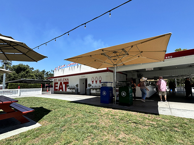 The iconic white exterior of Gott's Roadside with its bold "EAT" sign&mdash;a siren call to hungry travelers that brooks no argument.