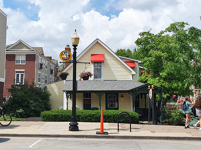 The charming yellow house on Carmel's Main Street isn't just another pretty facade—it's home to some of Indiana's most celebrated beef architecture.