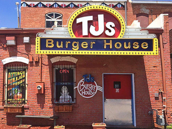 That iconic yellow and red sign against classic brick isn't just restaurant signage&mdash;it's a beacon of burger hope for hungry Kansans everywhere.