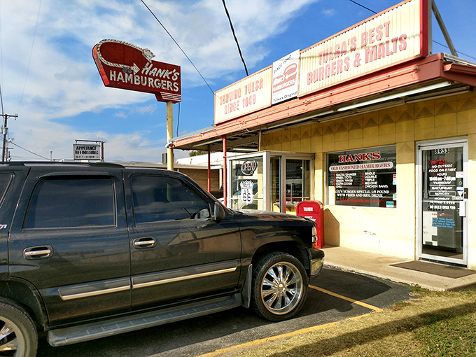 The neon promise of burger paradise! Hank's iconic sign has been guiding hungry Tulsans to burger bliss since the days when Elvis was still topping the charts.