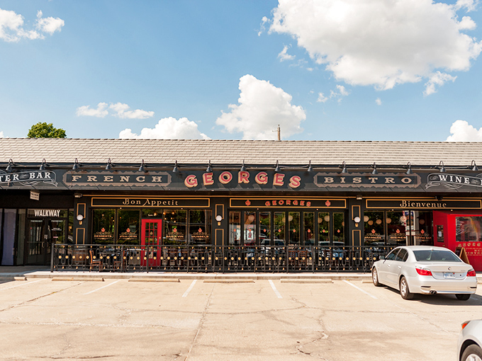 The black and gold fa&ccedil;ade of Georges French Bistro stands proudly against the Kansas sky, promising Parisian delights with Midwestern hospitality.