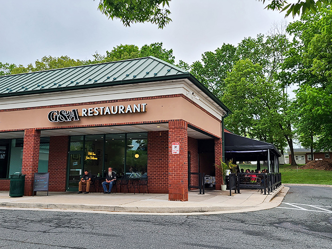 The unassuming storefront of G&A Restaurant beckons with its vintage orange awning &ndash; a time capsule of flavor waiting to be discovered.