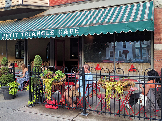 The emerald awning and red bistro chairs aren't just saying "Bonjour!"&mdash;they're practically singing La Marseillaise on this charming Cleveland corner.