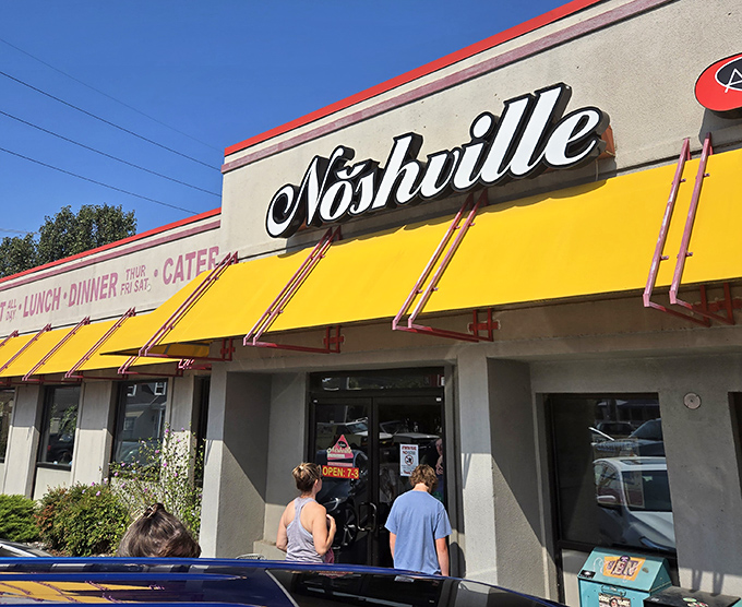 That iconic yellow awning isn't just a sunshade&mdash;it's a beacon of hope for sandwich lovers seeking refuge from Nashville's hot chicken monopoly.