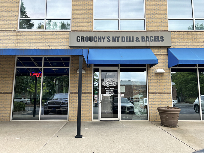The unassuming storefront with its bright blue awnings might fool you, but inside Grouchy's lies a Manhattan experience that miraculously landed in Alpharetta.