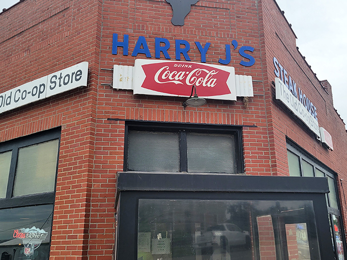 The humble brick exterior of Harry J's Steakhouse belies the culinary treasures within, a classic case of "don't judge a steak by its storefront."