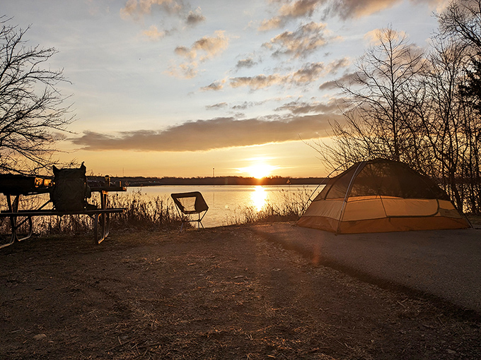 Home sweet temporary home! This spacious campsite offers the perfect blend of wilderness and comfort, complete with a turquoise picnic setup that screams "vacation mode activated."