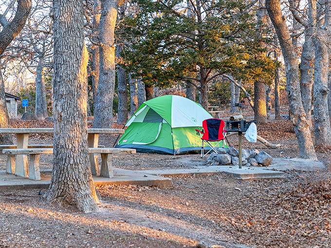 Home sweet wilderness! A cozy travel trailer nestled among autumn oaks creates the perfect basecamp for adventures in Oklahoma's rugged backcountry.