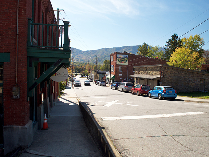Downtown Black Mountain welcomes visitors with its classic small-town charm, where brick buildings frame picture-perfect mountain views in the distance.