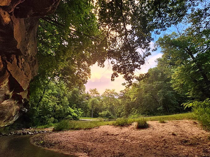 Nature's perfect mirror: sandstone cliffs reflect in the crystal-clear waters of Pea's Creek, creating Iowa's version of a double feature you don't need Netflix for.