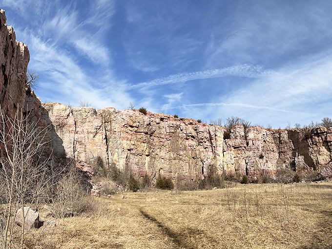 The dramatic quartzite cliffs of Blue Mounds rise like nature's skyscrapers from the prairie, a geological marvel that would make the Grand Canyon blush with envy.