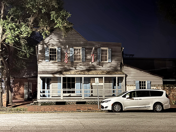 The weathered wooden exterior tells tales older than America itself. This historic landmark has watched Savannah grow from seafaring port to Southern belle.